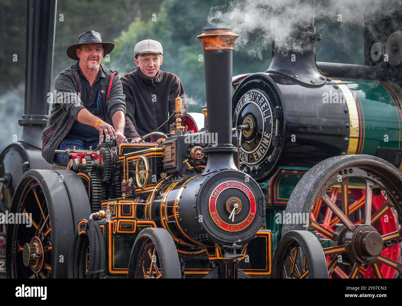 Dave Davis (left) and George Venn (right) drive a Burrell double crank ...