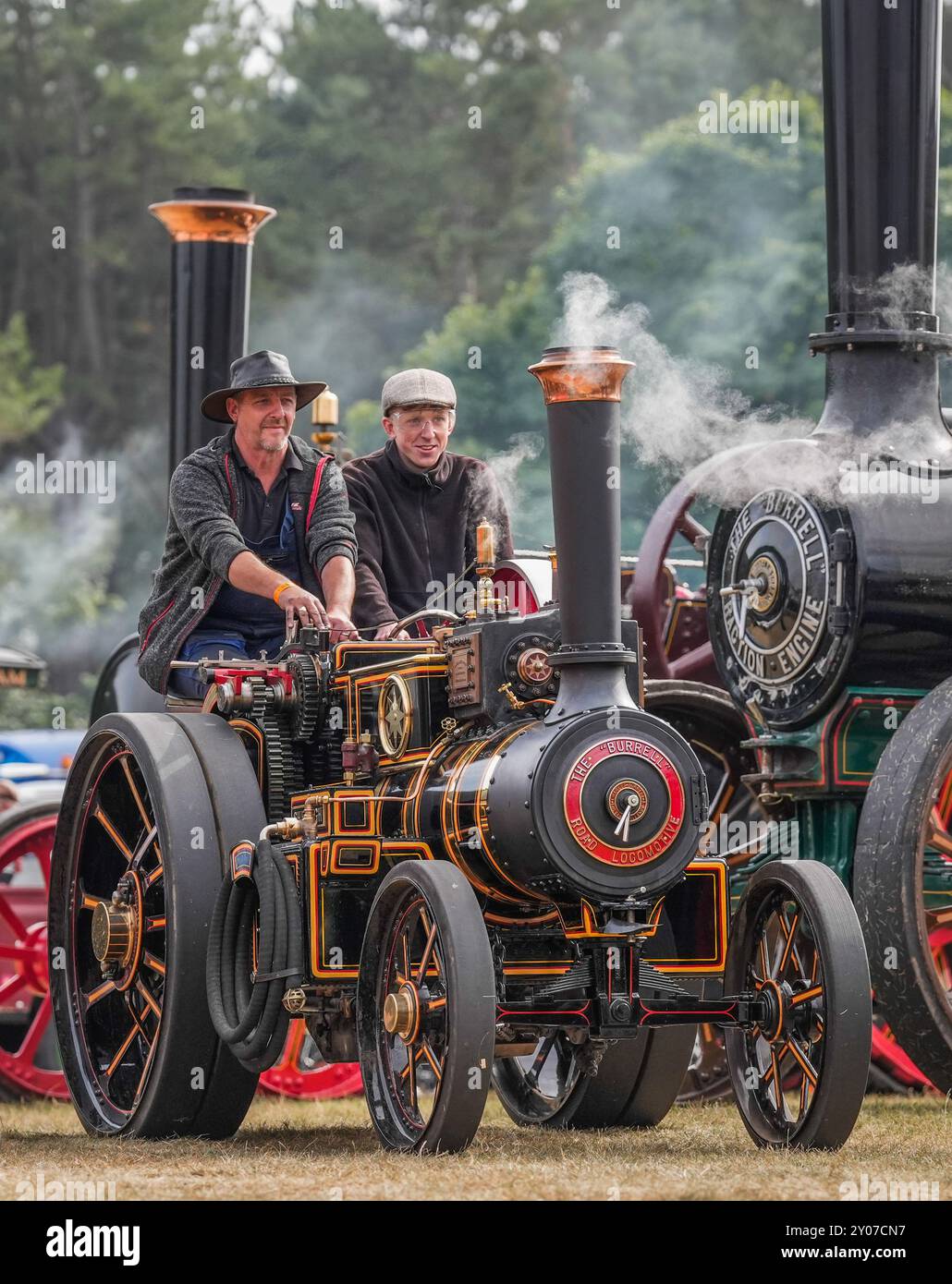 Dave Davis (left) and George Venn (right) drive a Burrell double crank ...