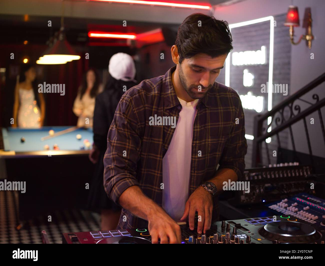 Male DJ playing music in club . Nightlife and disco concept Stock Photo ...