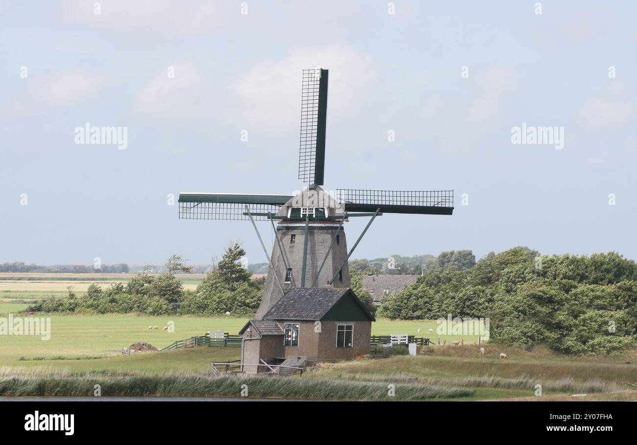 A beautiful old historic windmill, with four wings A beautiful old ...