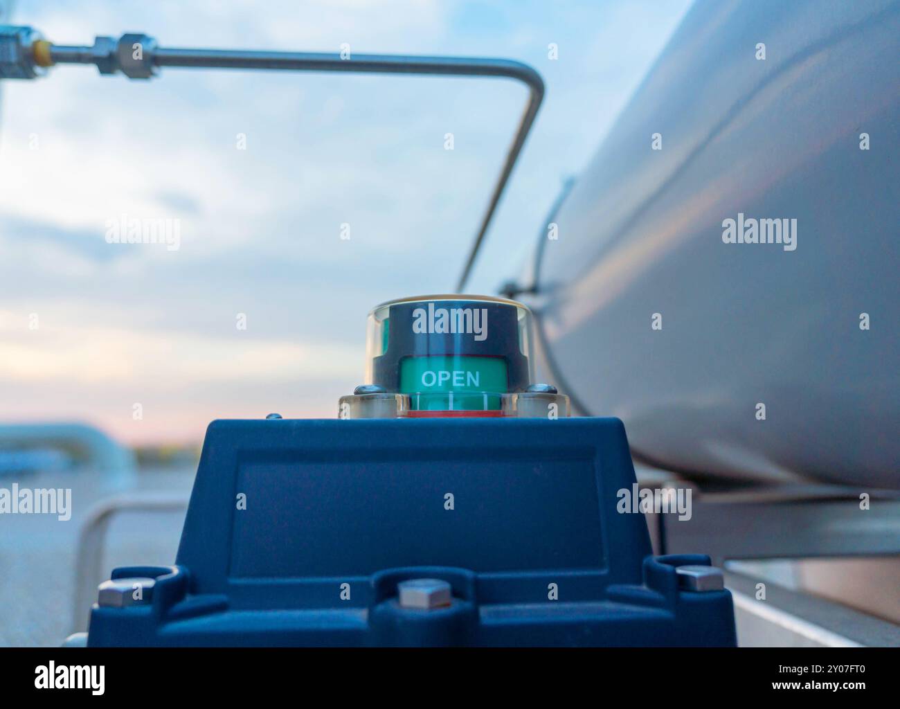 Valve drive cover with green mechanical indicator open Stock Photo - Alamy