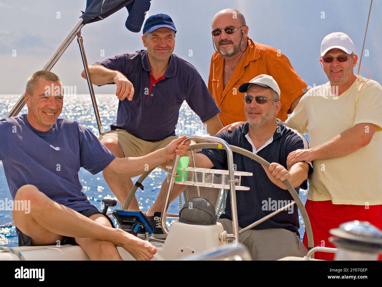 Group of guys on yacht hi-res stock photography and images - Alamy