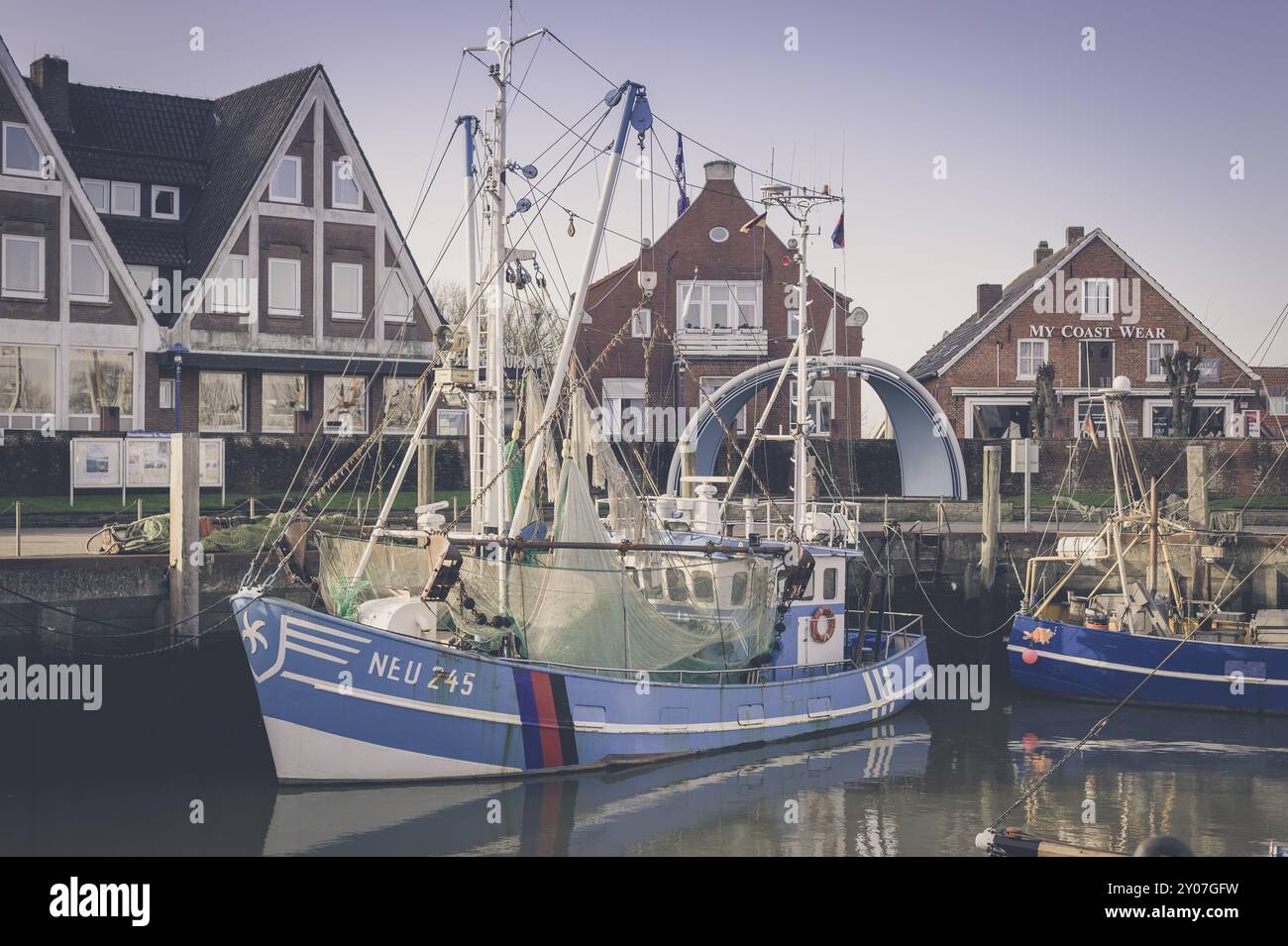 Crab catcher on the south pier of the fishing harbour of ...