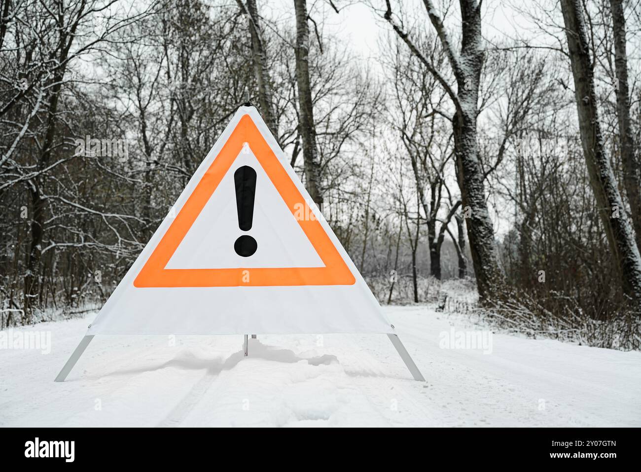 Sign with exclamation mark in the forest Stock Photo - Alamy