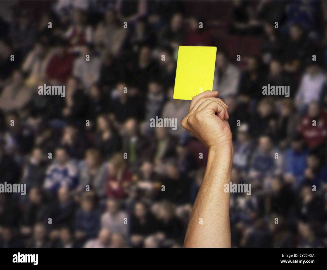 Yellow card referee Stock Photo - Alamy