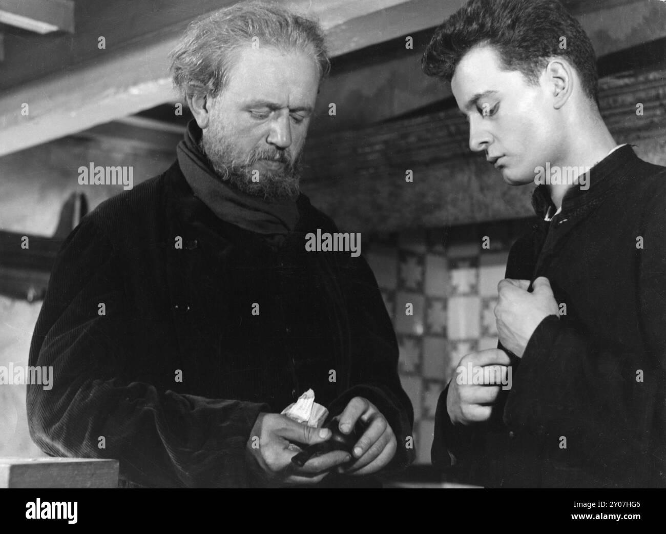 ANTOINE BALPETRE and CLAUDE LAYDU in a scene from LE JOURNAL D'UN CURE ...
