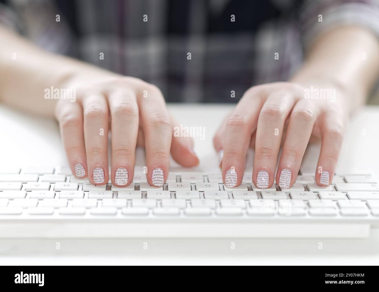 Typist with painted typo fingernails Stock Photo - Alamy
