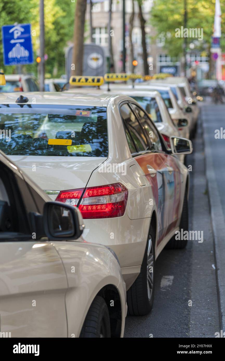 Taxi rank in portrait format Stock Photo - Alamy