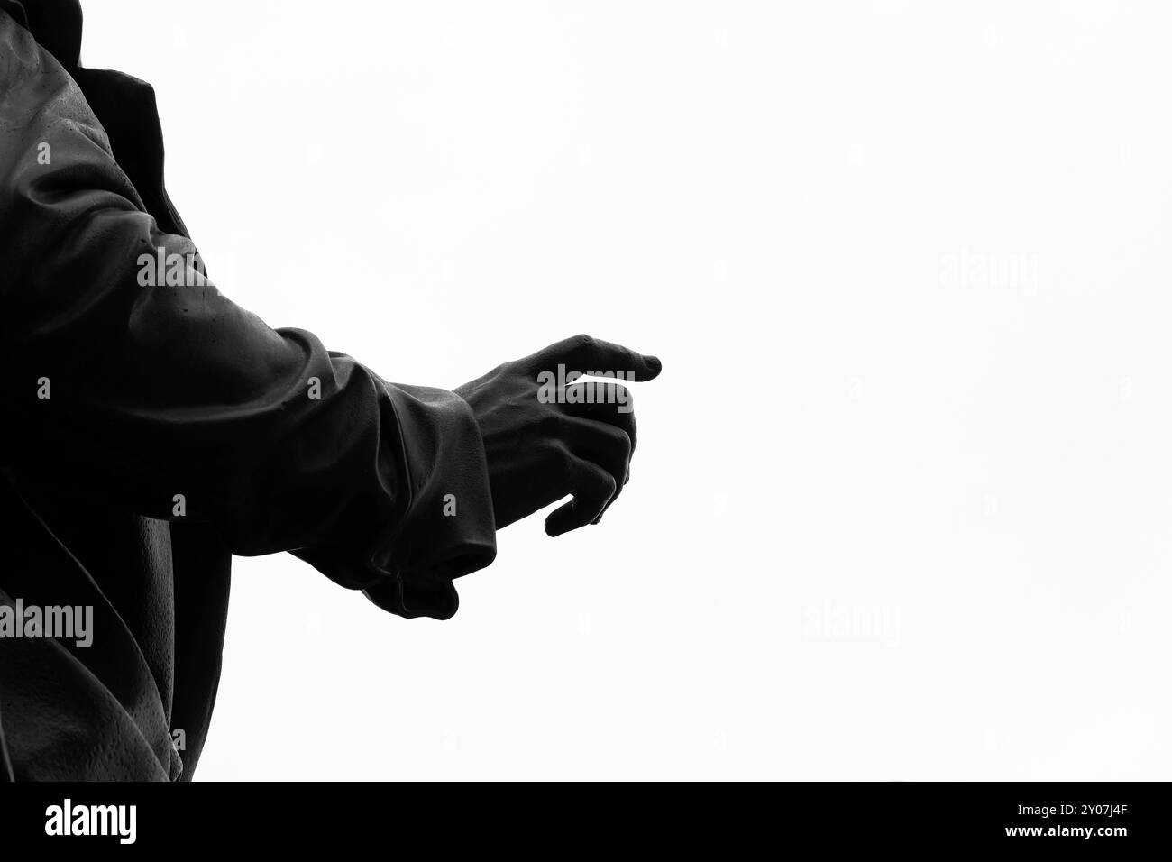 Arm pointing in one direction with white background Stock Photo - Alamy