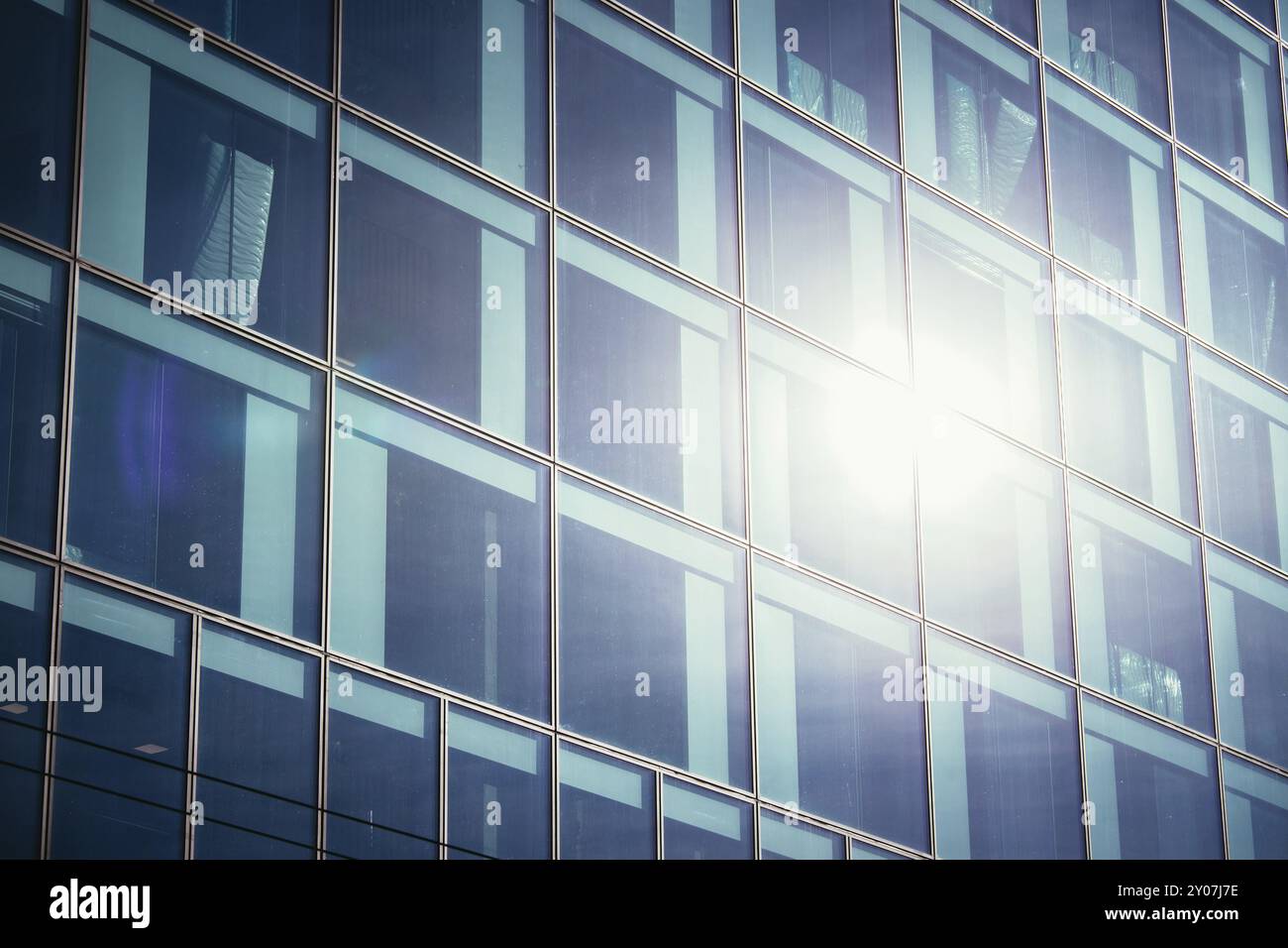 Modern office building: Skyscraper with blue glass Stock Photo - Alamy