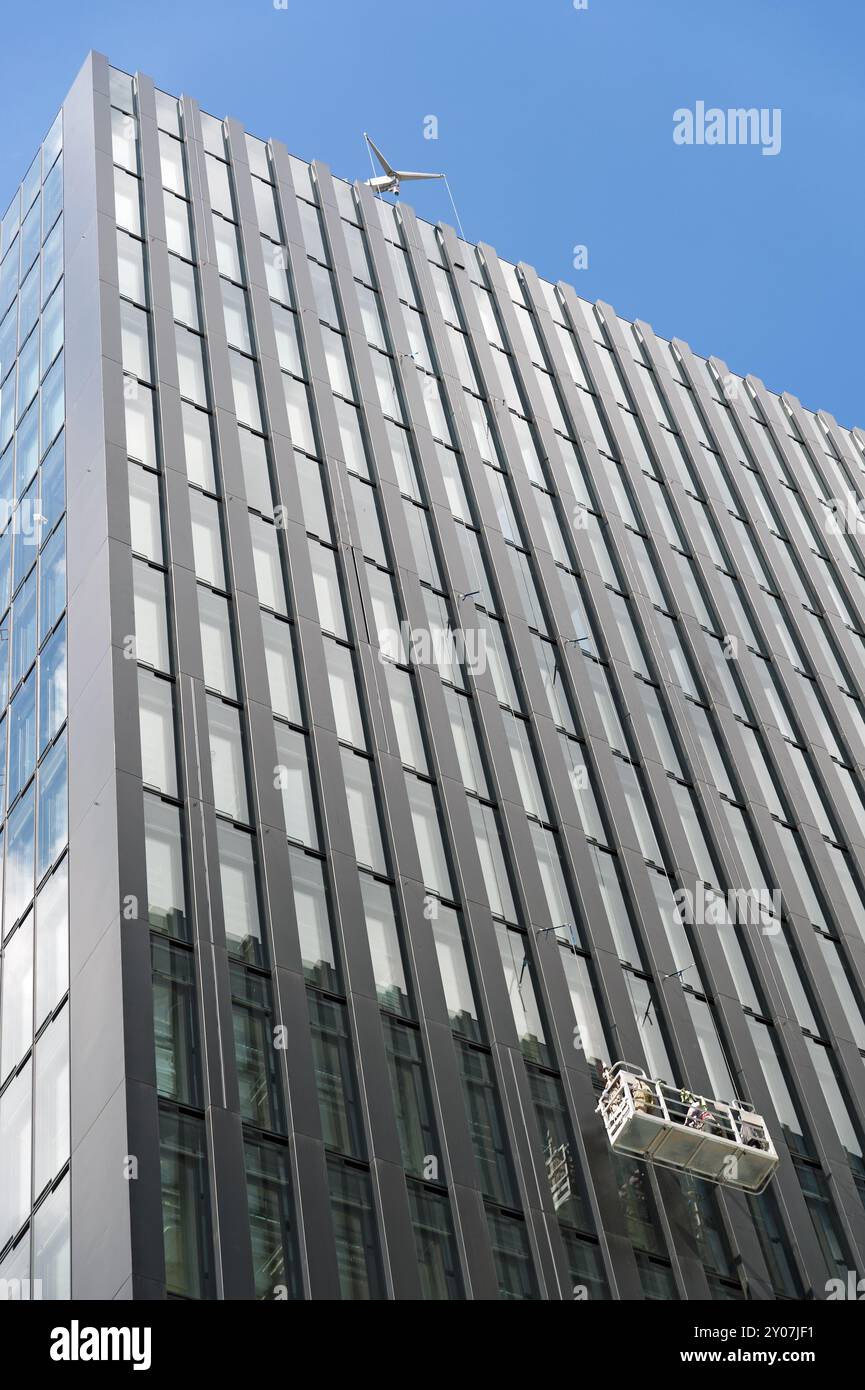 Tower block with window cleaners' working platform Stock Photo - Alamy