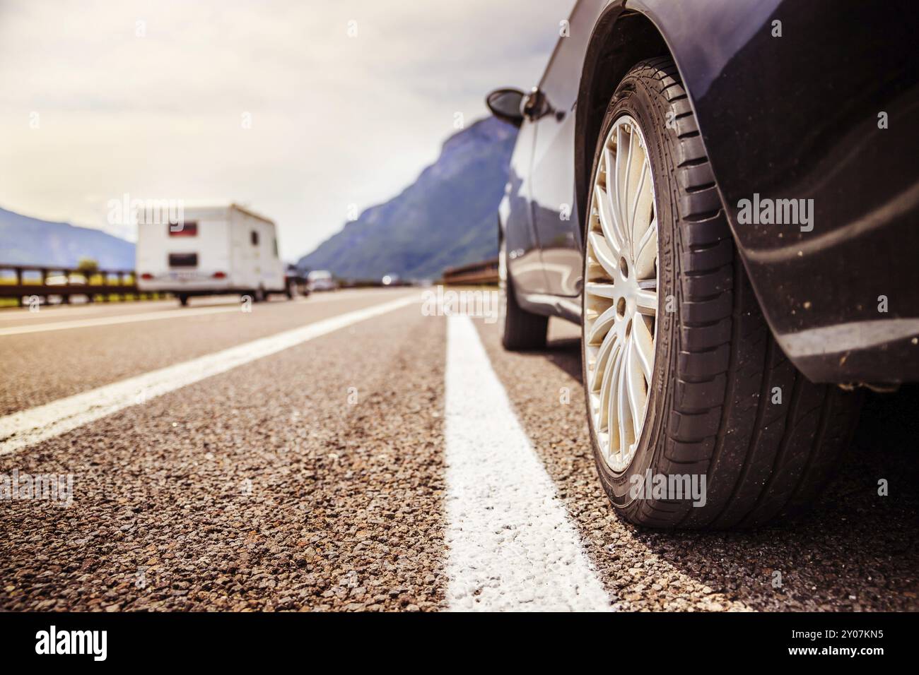 Close up of a car standing on a breakdown lane, summer vacation Stock ...