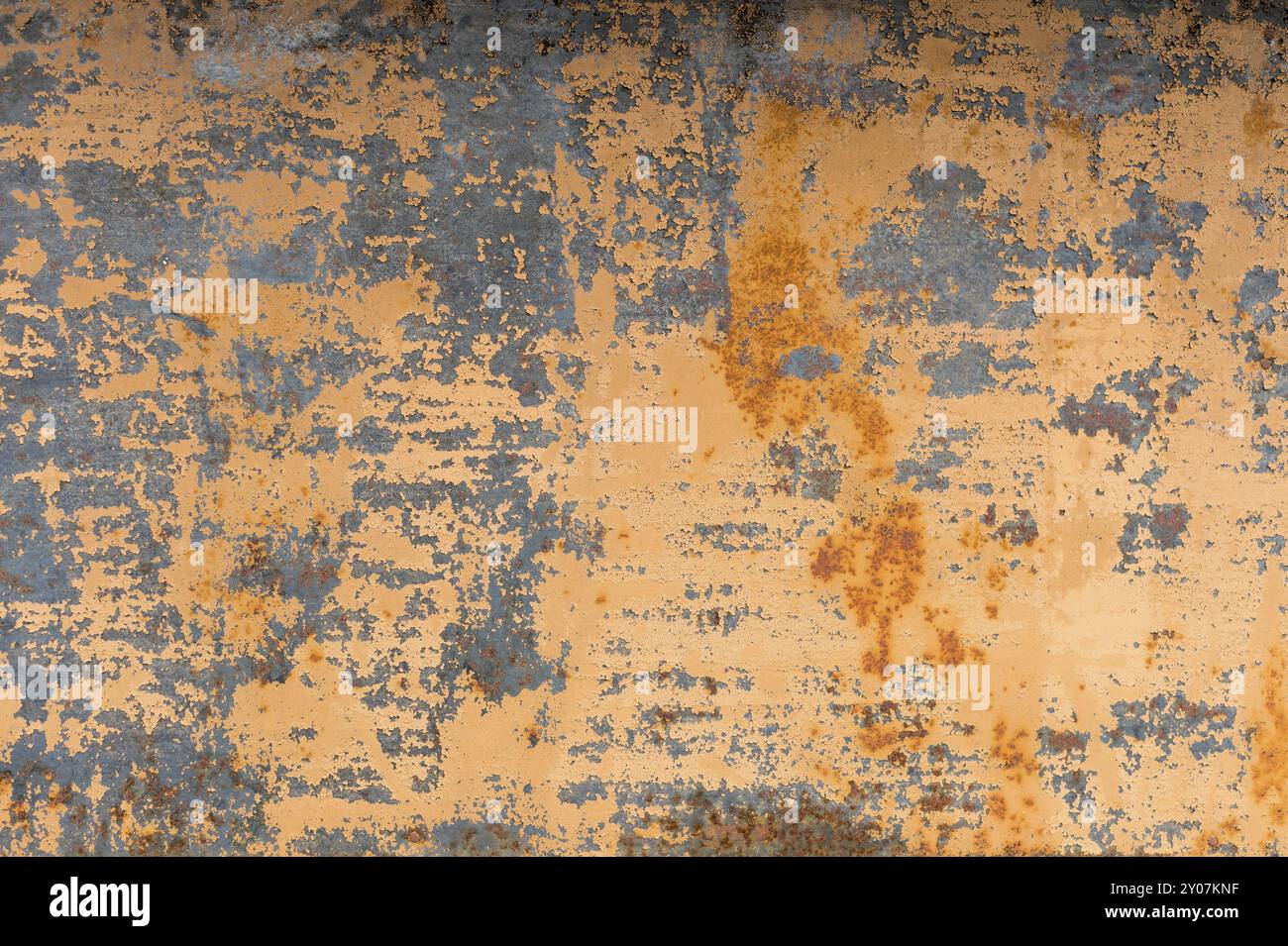 Textured background of a faded yellow paint with rusted cracks on ...