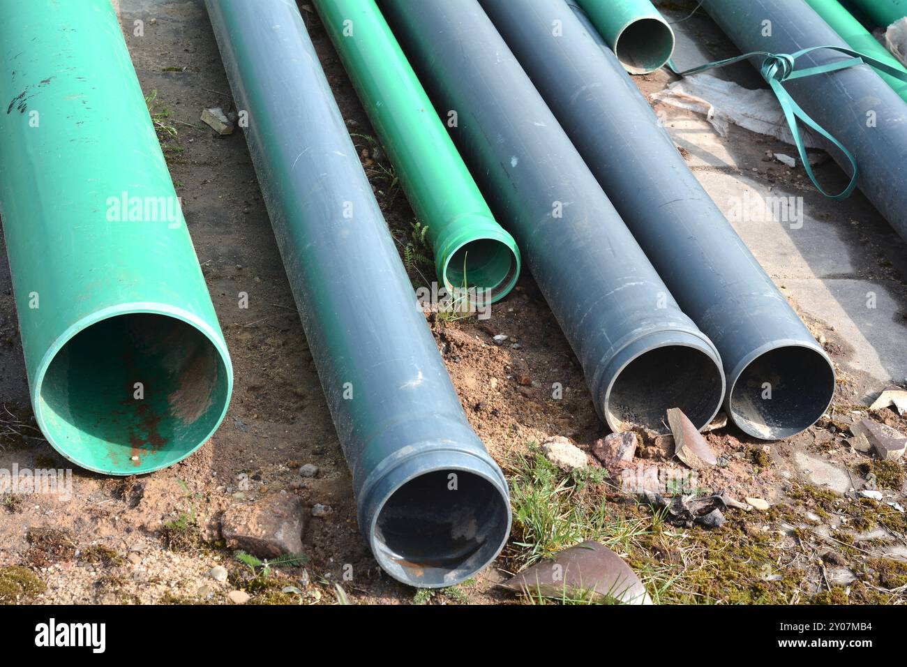Pipes as building material on a construction site Stock Photo - Alamy