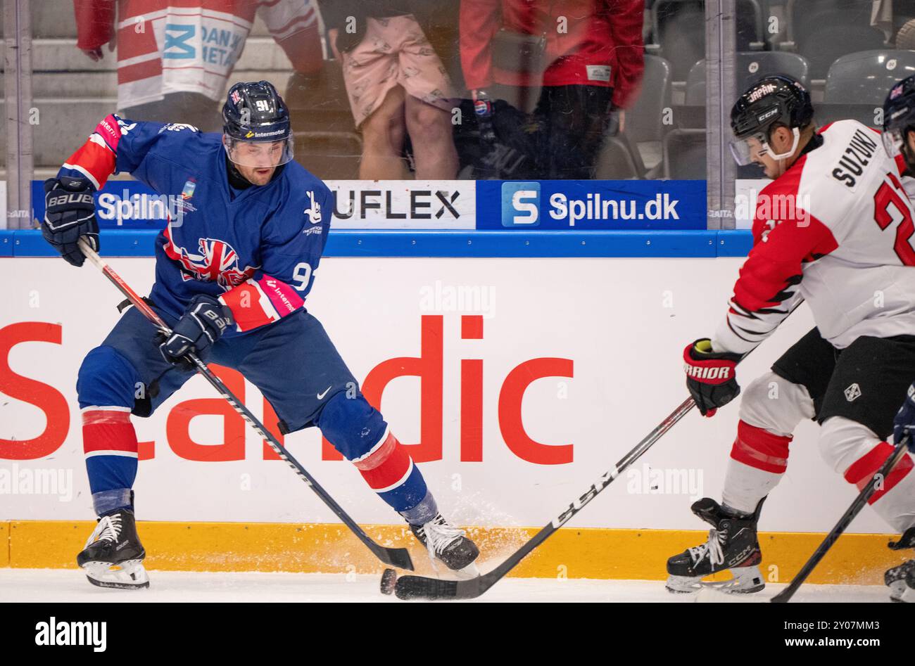 England's Ben Lake battles with Japan's Kento Suzuki during the Ice ...