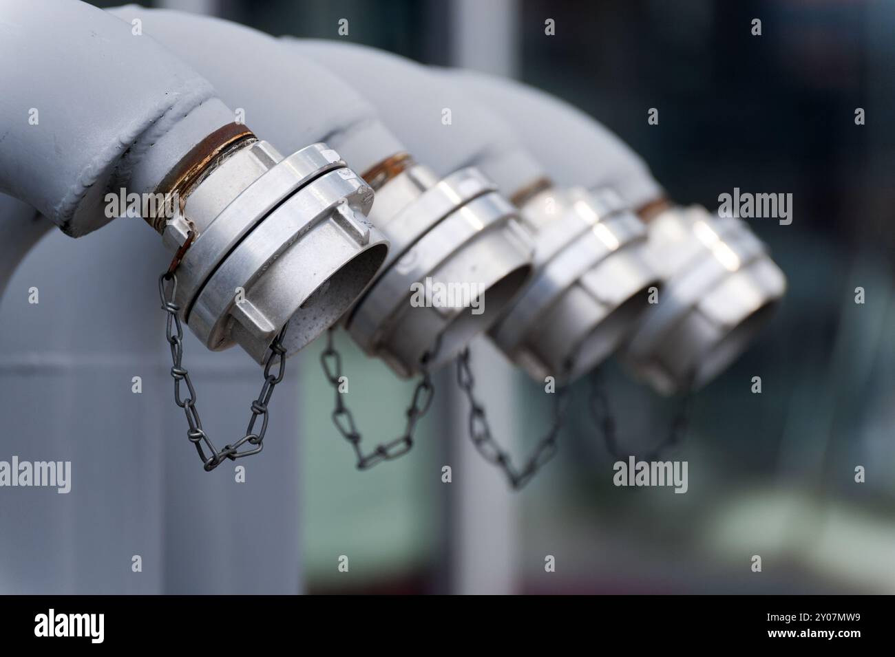 4 water connections in series next to each other Stock Photo - Alamy