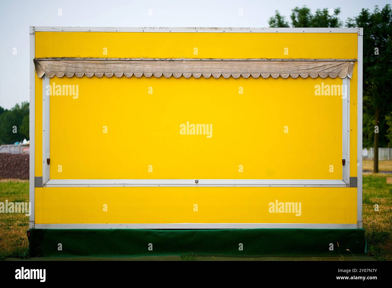 Yellow sales stand f Stock Photo - Alamy