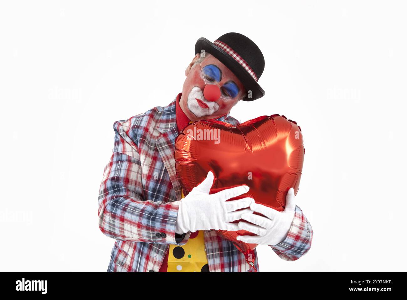 Clown is in love Stock Photo - Alamy