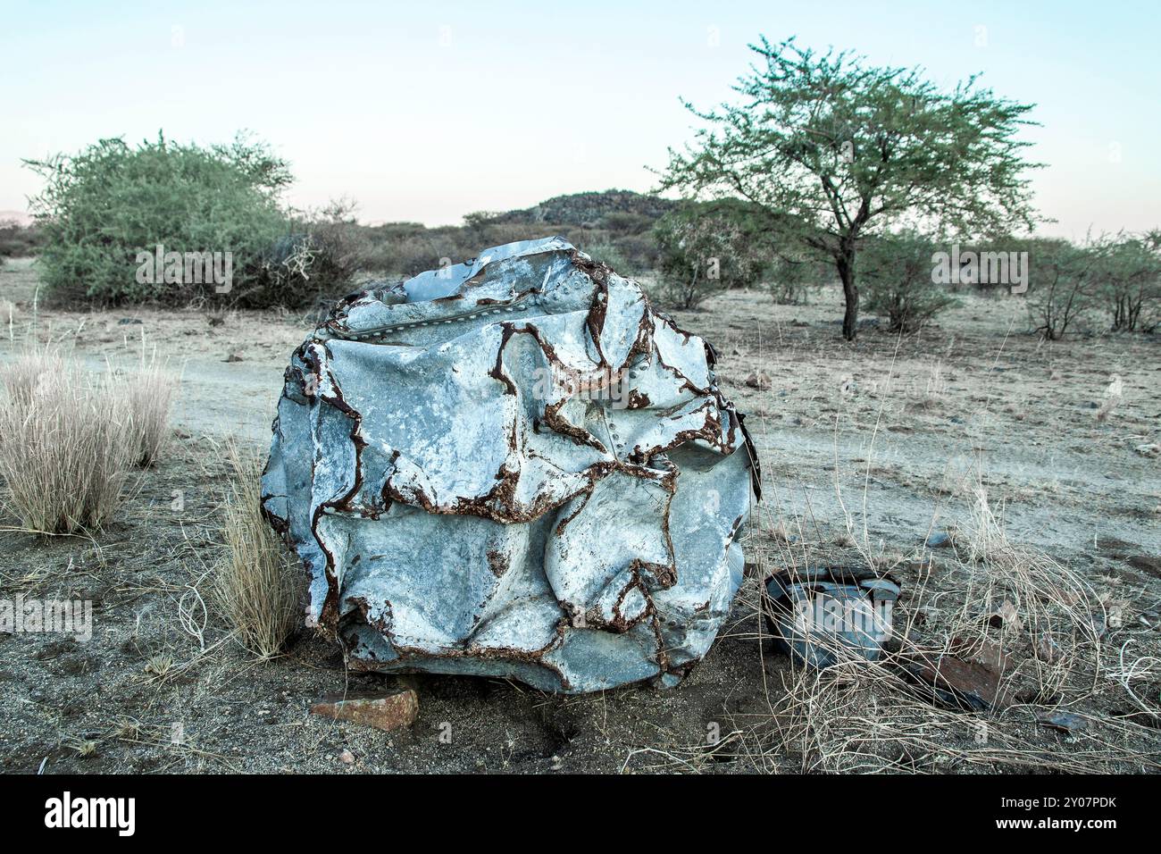 This galvanised metal ball was used in mining marble. It was forced ...