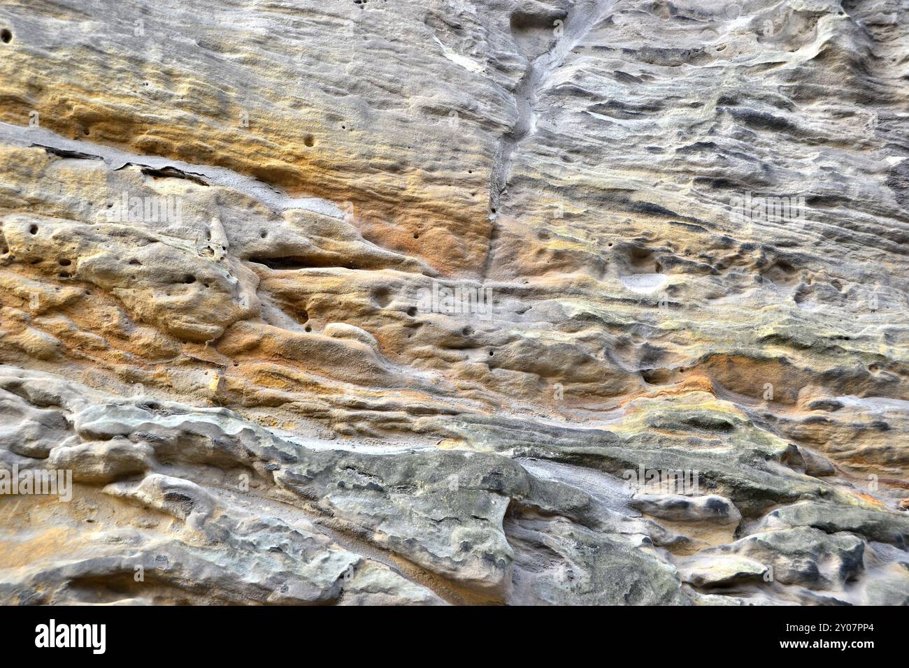 Structure and colours of a sandstone rock Stock Photo - Alamy