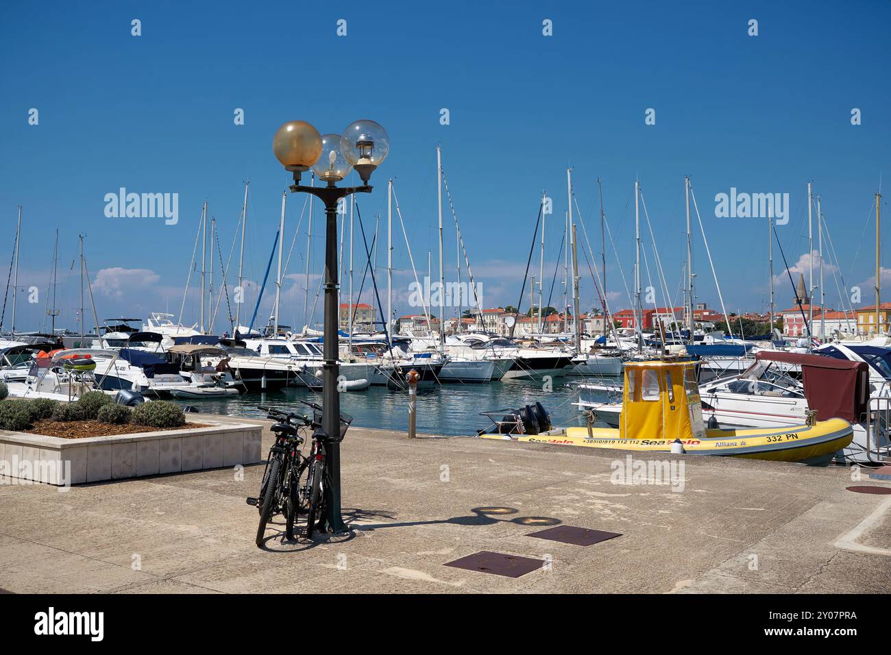 View of the marina in Porec in Croatia with waterfront promenade Stock ...