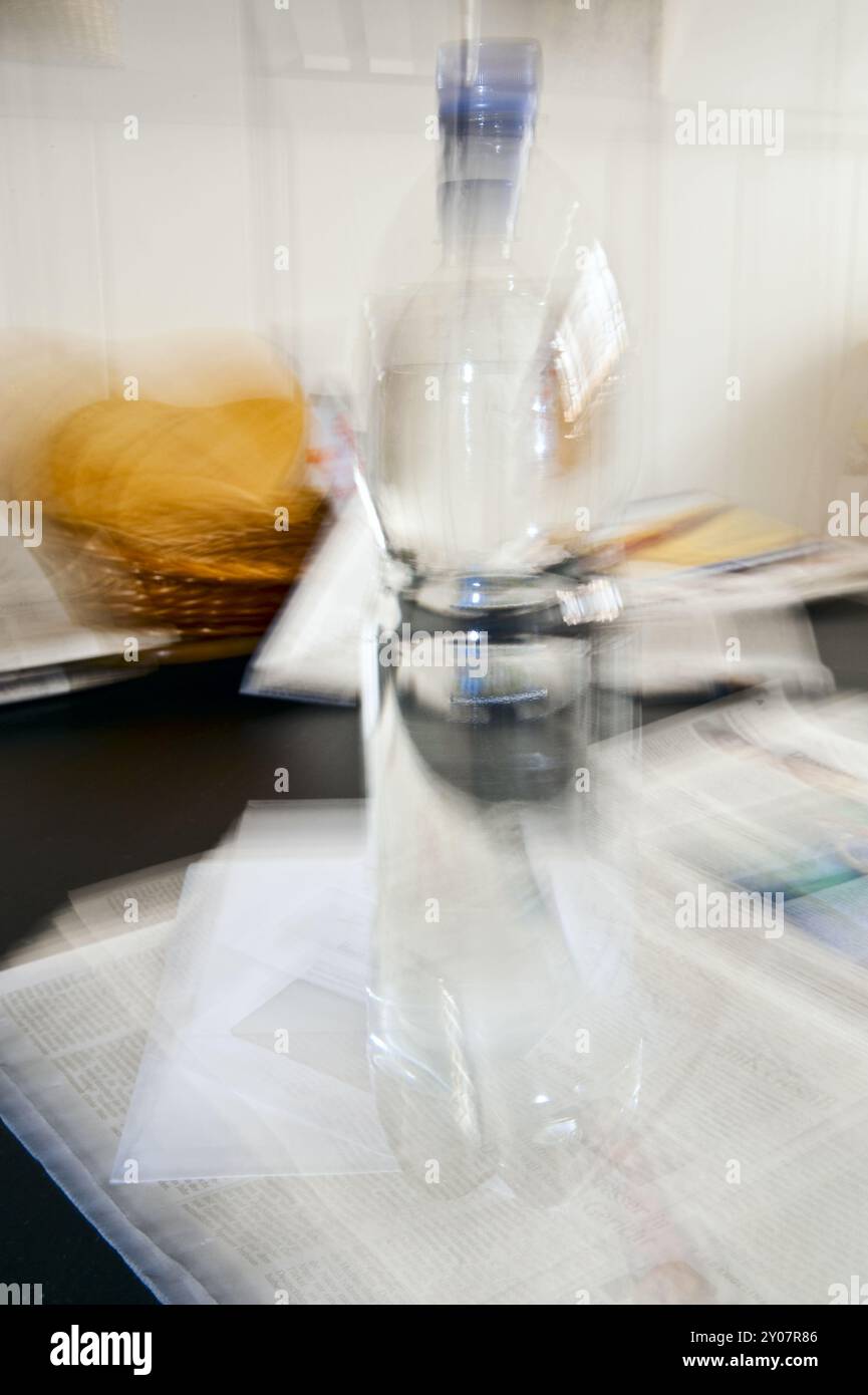 Water bottle on the kitchen table Stock Photo - Alamy