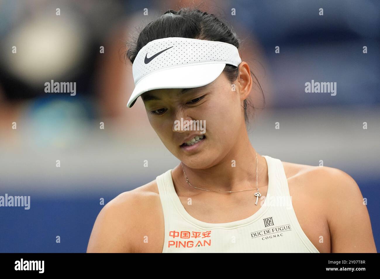 Yafan Wang, of China, reacts after losing a point to Paula Badosa, of ...