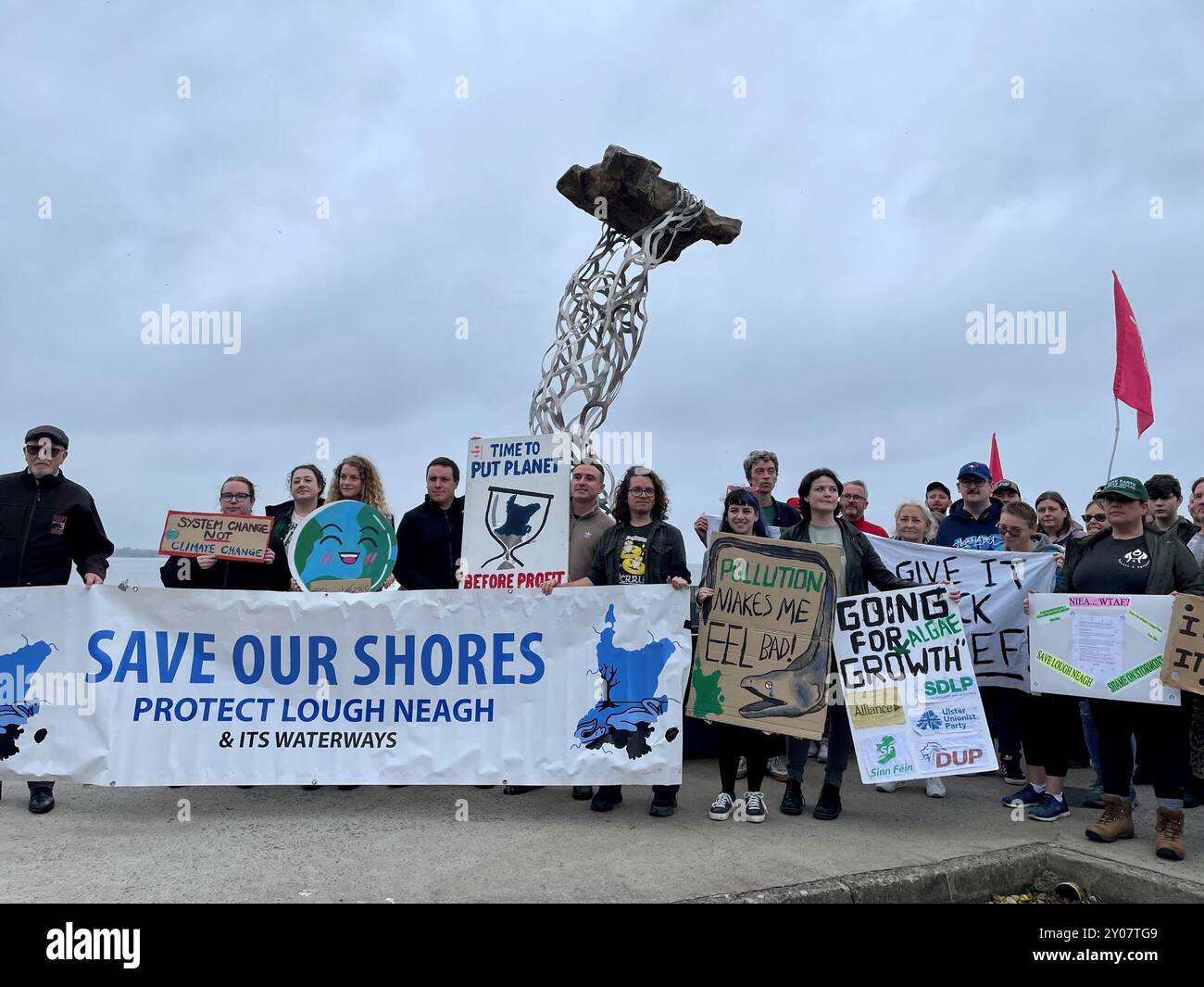 People at a protest at the Lough Protector statue in Antrim organised ...