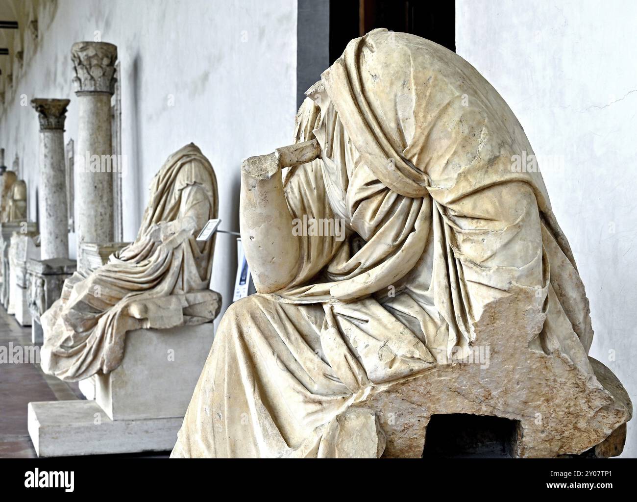 Two seated female figures, cloister, fragment Stock Photo - Alamy