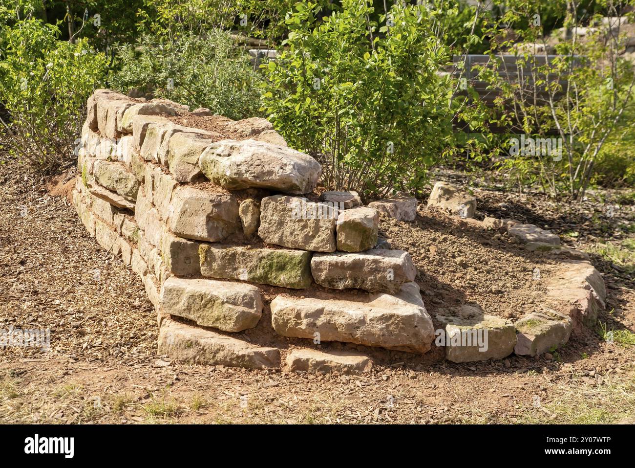 Self-built wall made of natural sandstone as a biotope for insects ...