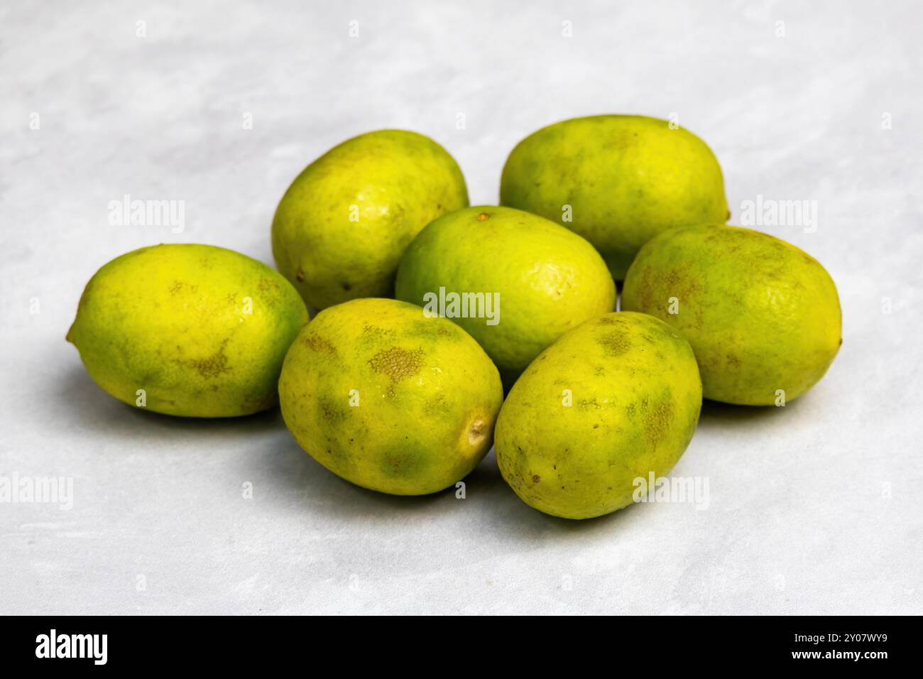 Fresh ripe lemons on white background Stock Photo - Alamy