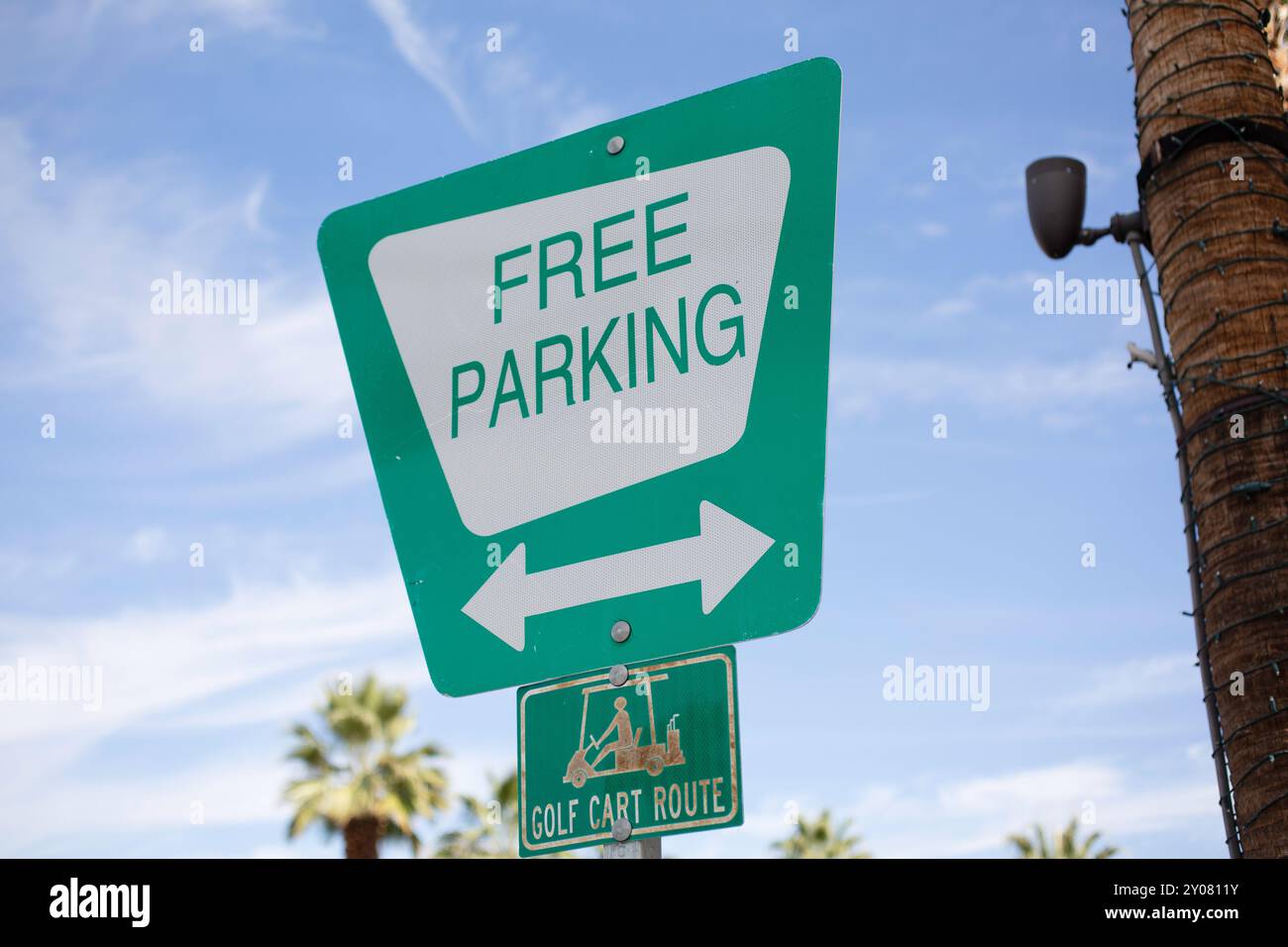 A view of a free parking sign Stock Photo - Alamy