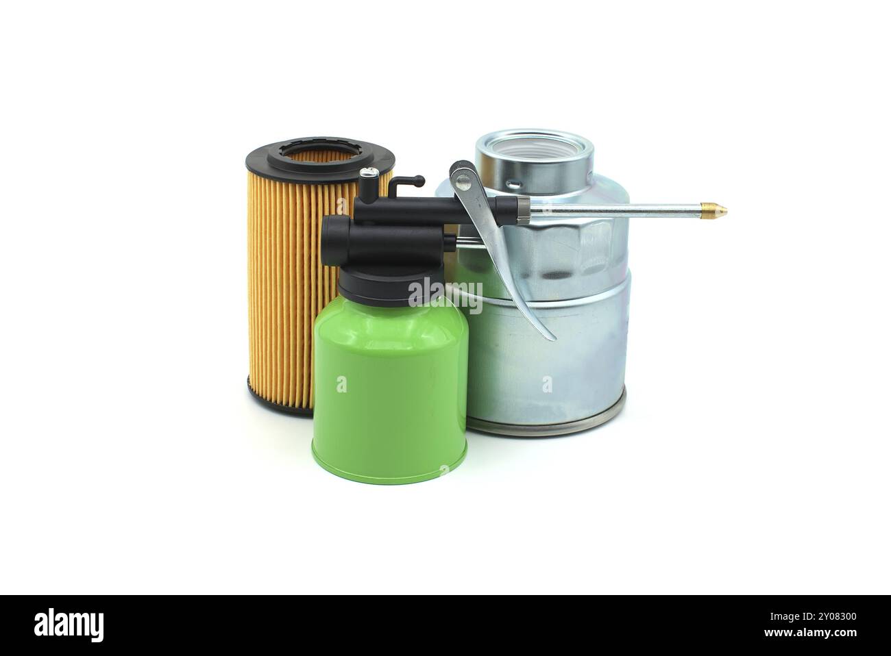 Vehicle engine oil filters and hand pump oiler isolated on a white ...