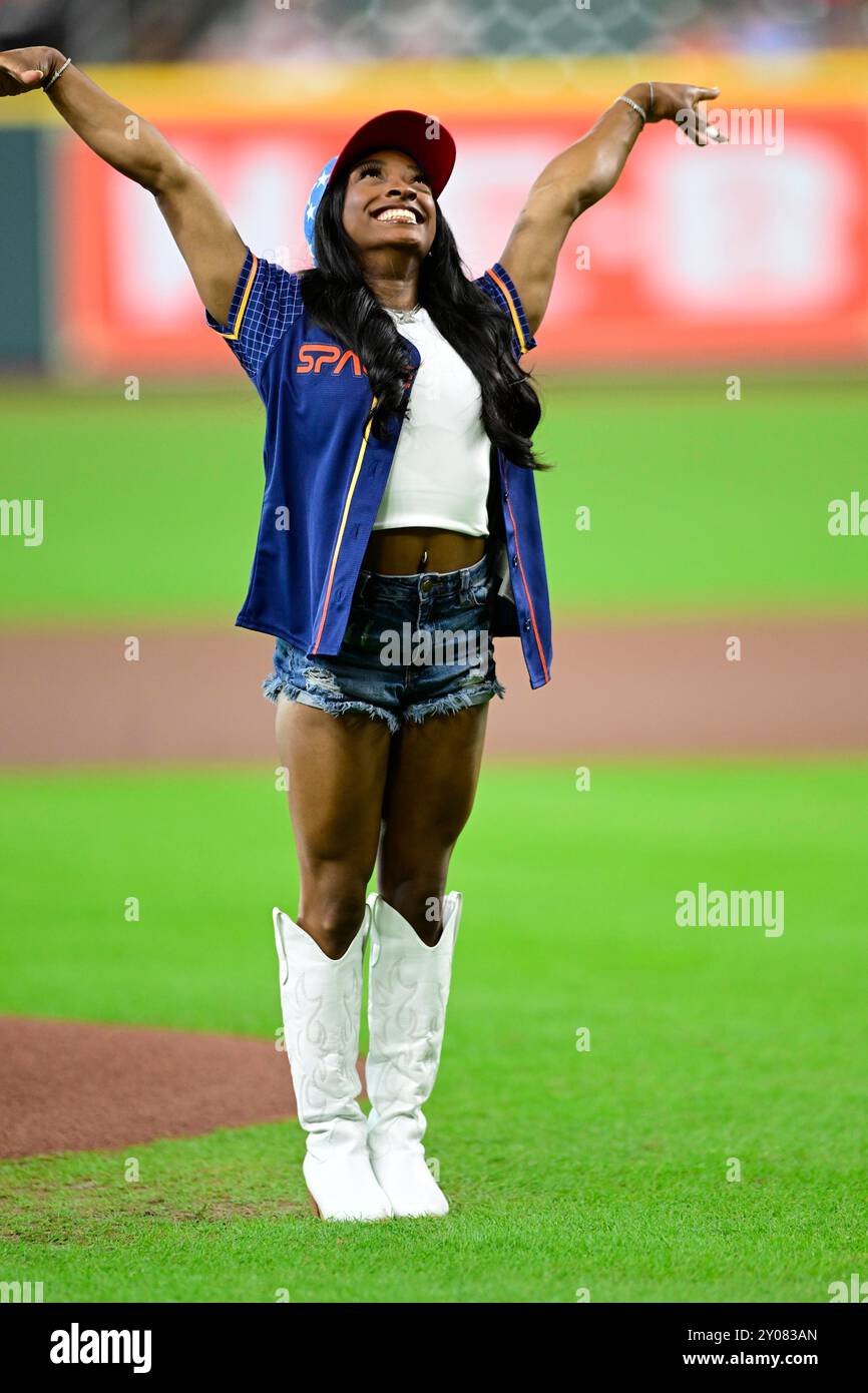 American Olympic Gold Medalist SIMONE BILES reacts after throwing out ...