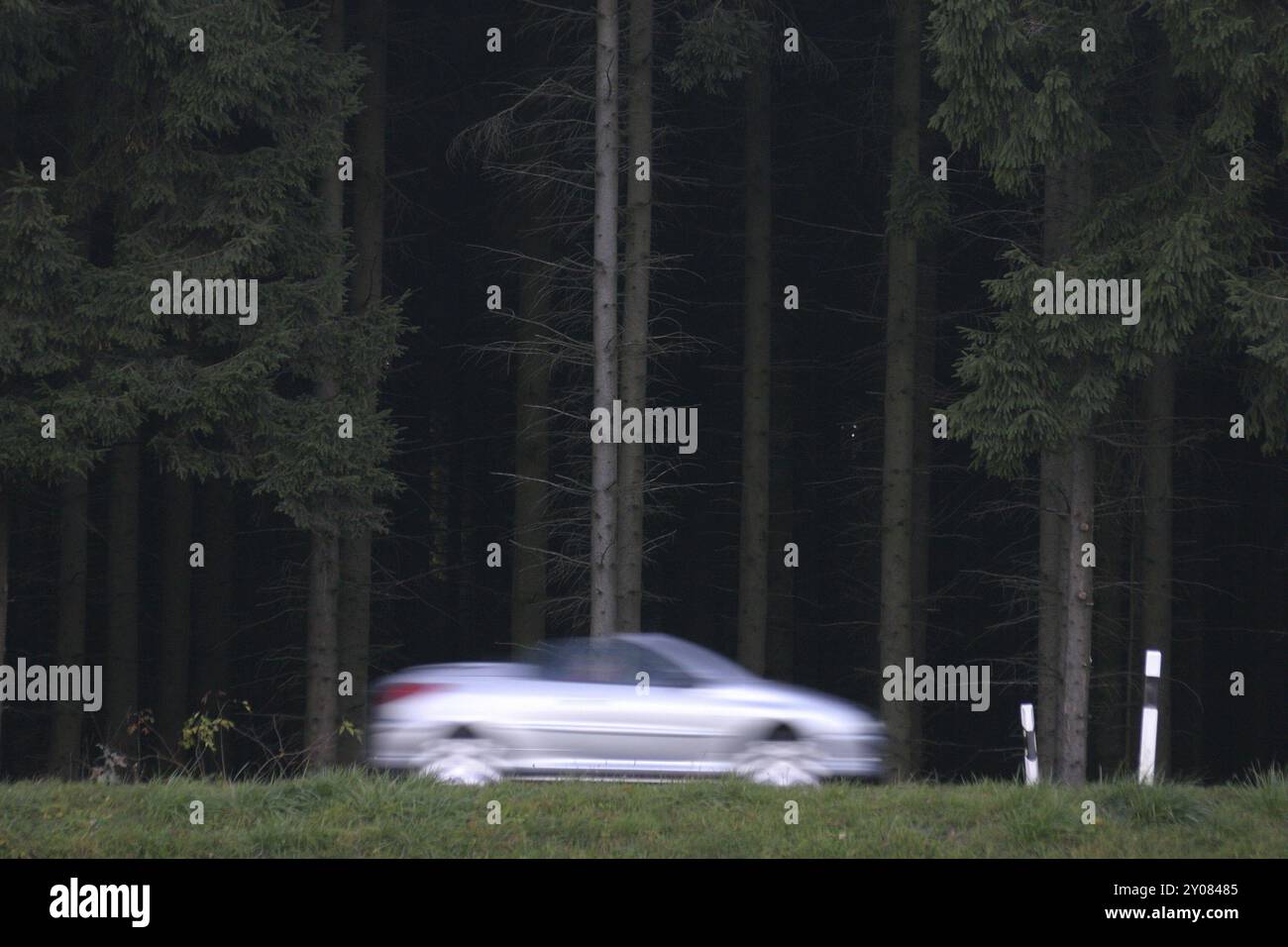 Road in forest passing vehicles hi-res stock photography and images - Alamy