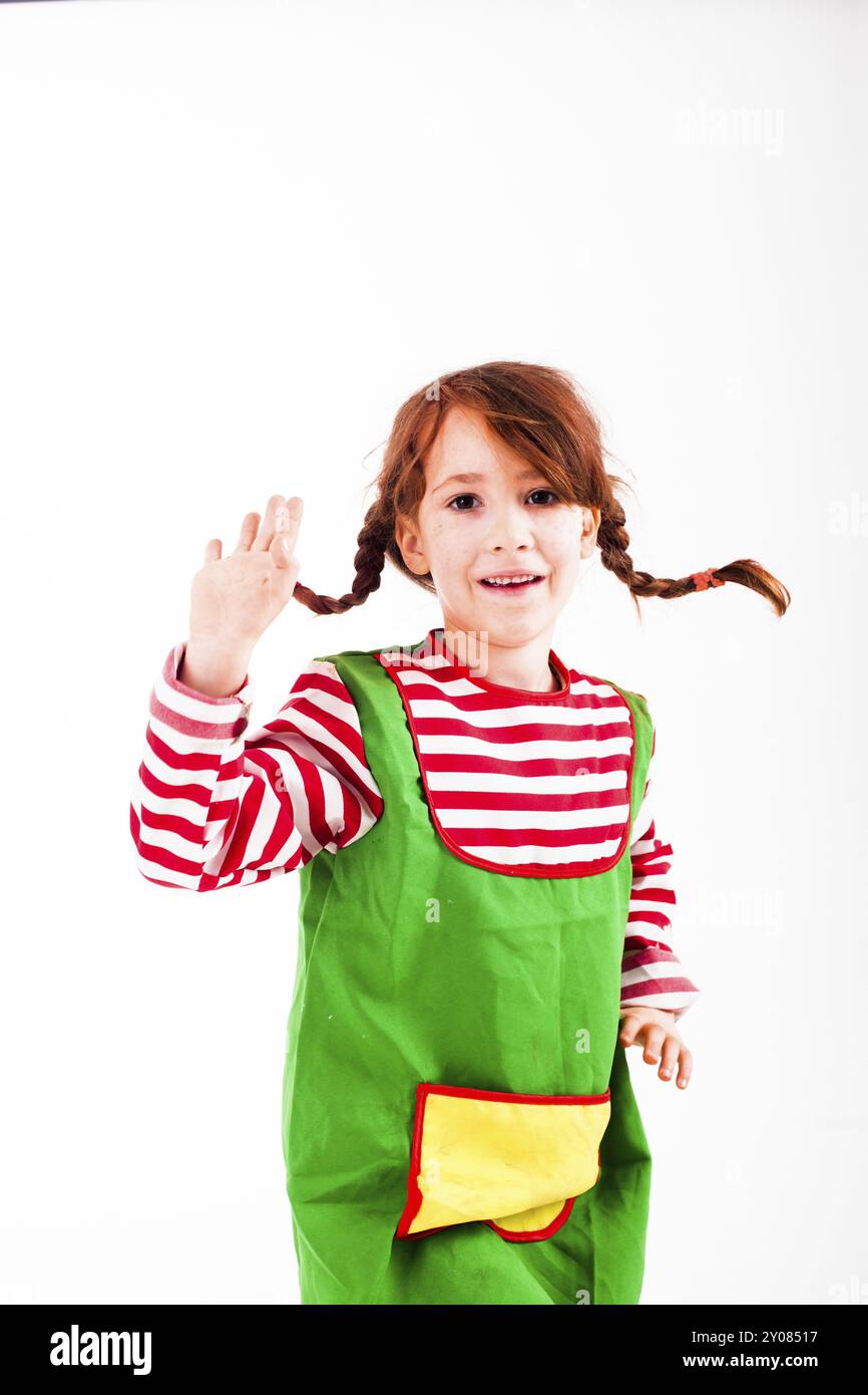 Little girl dressed as Pippi Longstocking with white background Stock ...