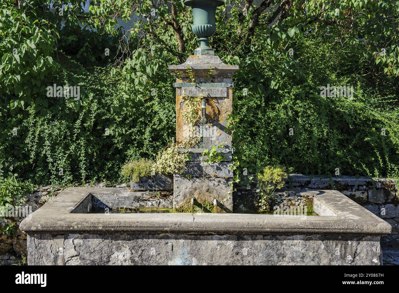 Old historic fountain with curved tap Water spout for permanent ...