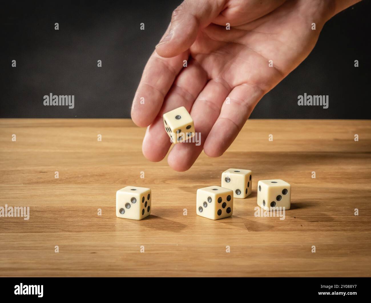 Throwing a dice hi-res stock photography and images - Alamy