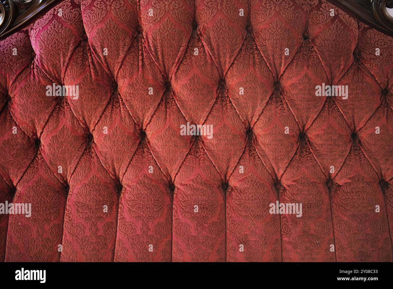 Seating back texture of a red rococco inspired sofa Stock Photo - Alamy