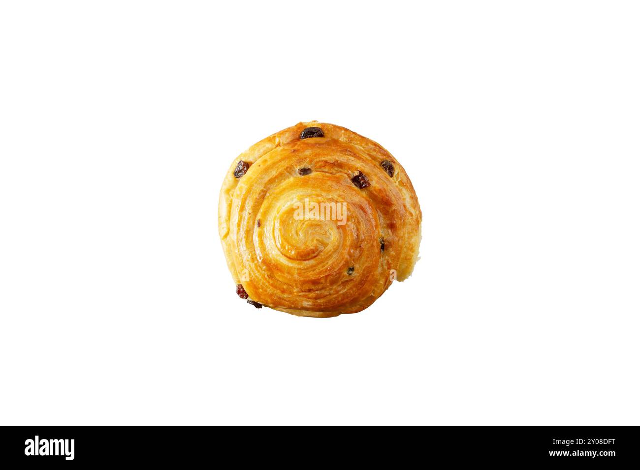 A top down view of a spiral raisin roll, against a white background ...
