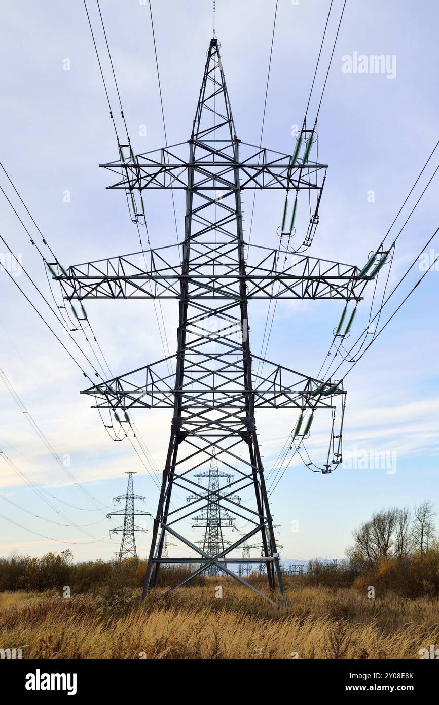 Reliance power lines closeup on the sky background Stock Photo - Alamy