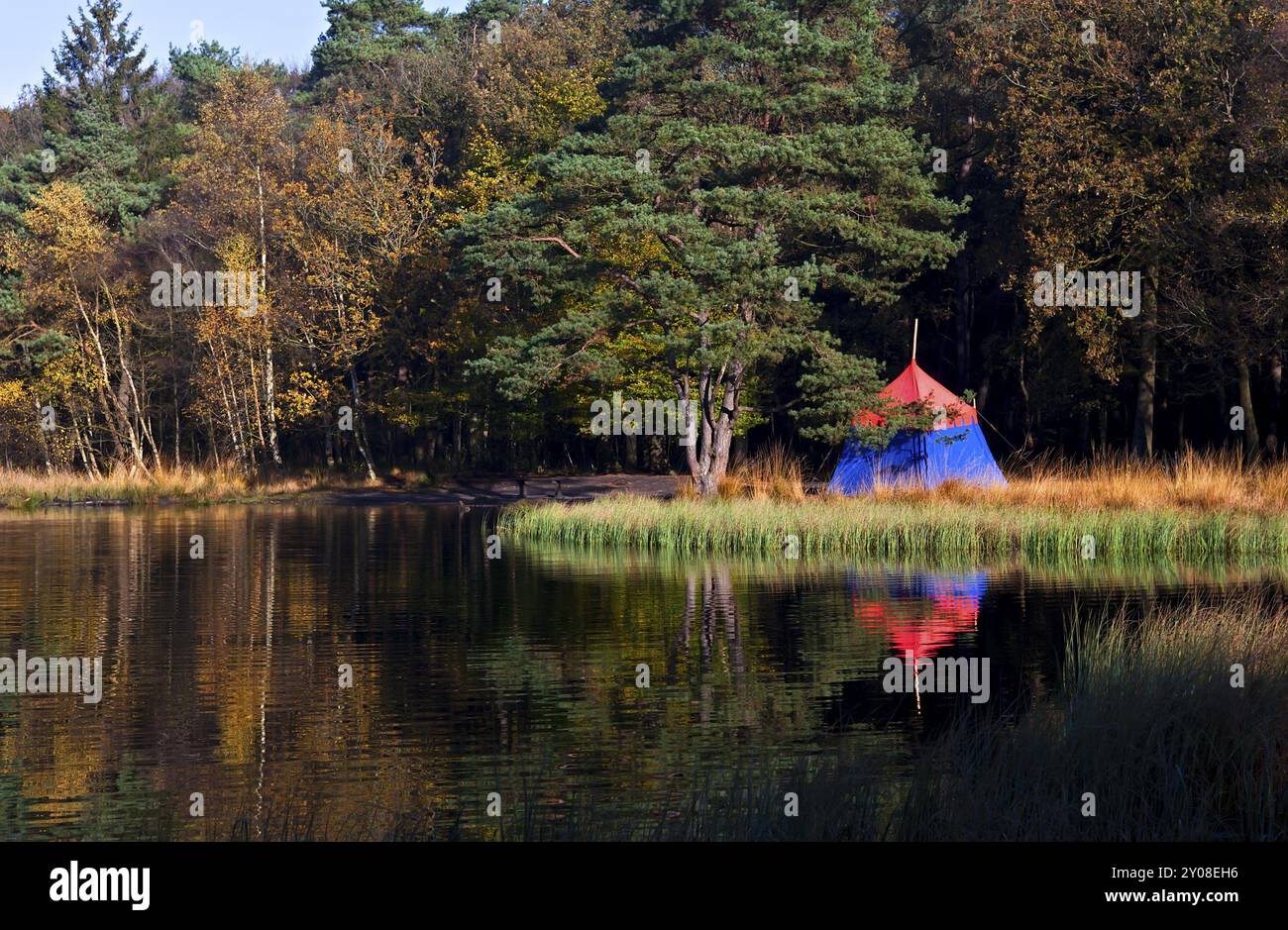 Old fashioned tent in forest close to lake Stock Photo - Alamy
