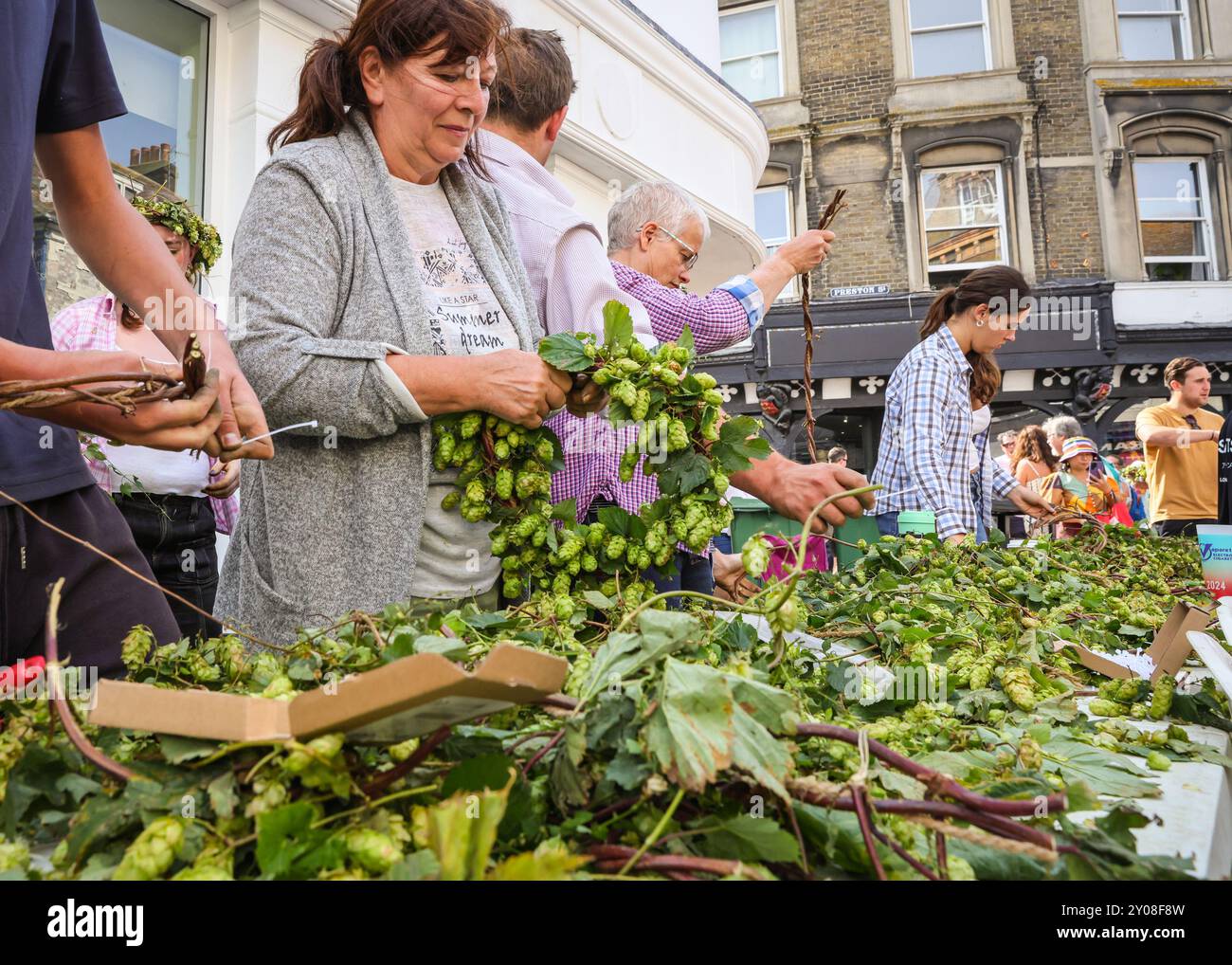 Faversham, Kent, UK. 01st Sep, 2024. Many visitors wear wreaths made ...