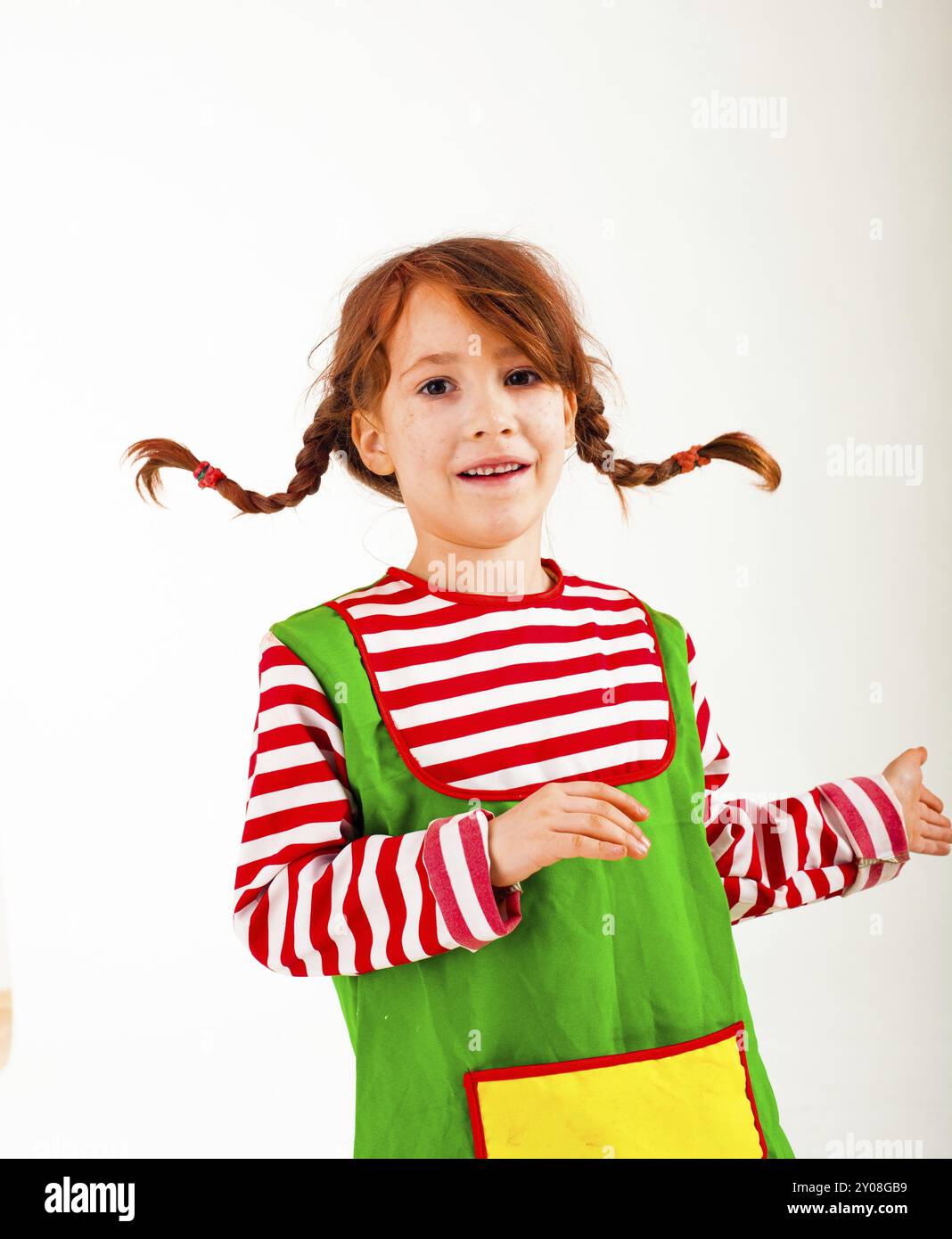 Little girl dressed as Pippi Longstocking with white background Stock ...
