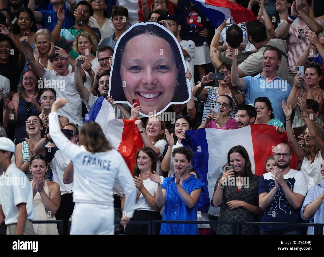 France's Emeline Pierre celebrates with her gold medal after winning ...