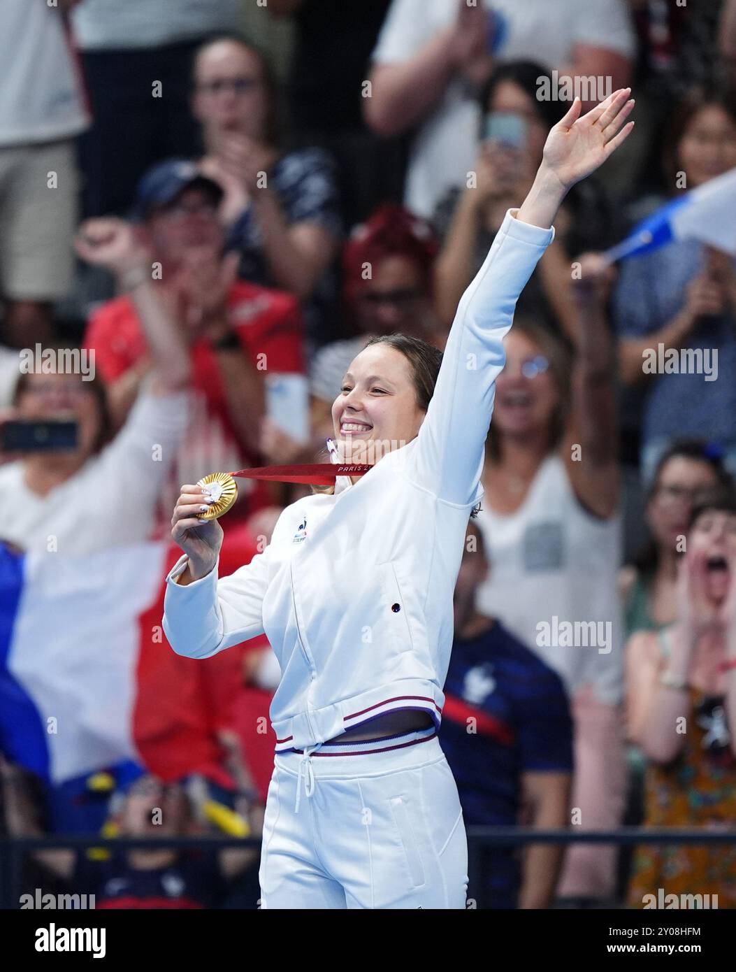 France's Emeline Pierre celebrates with her gold medal after winning ...