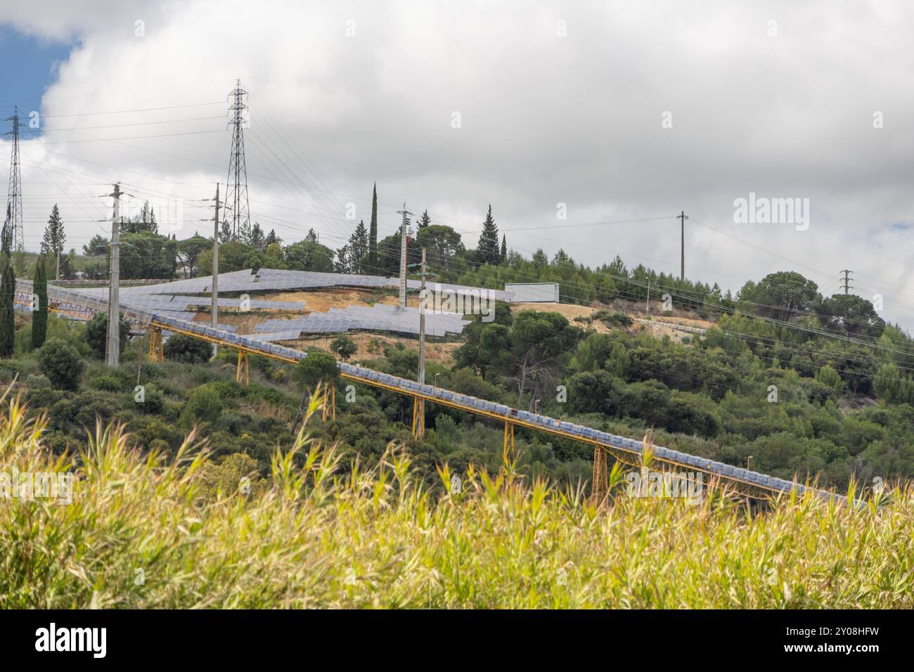 Conveyor belt transporting photovoltaic solar panels for installation ...