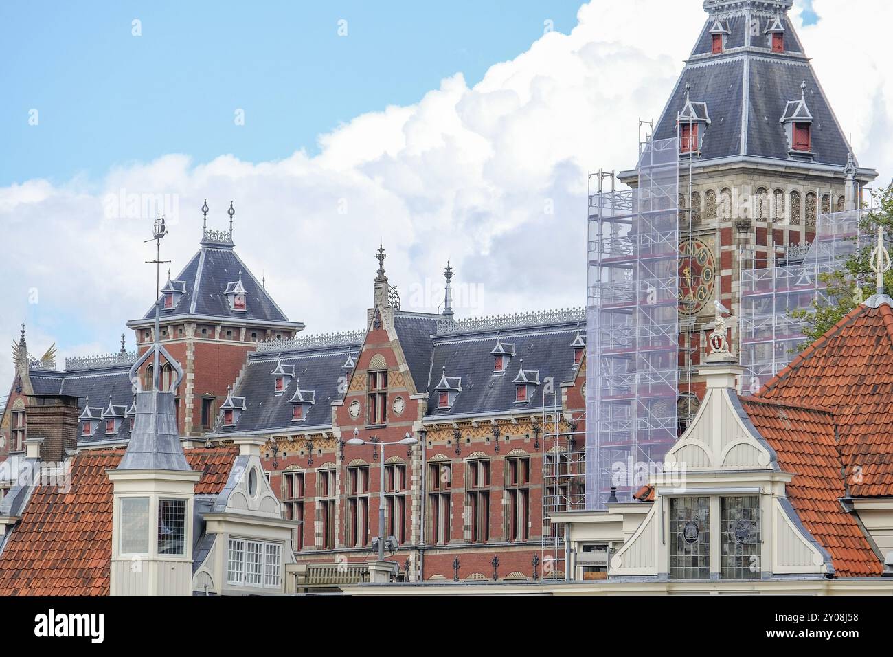 Historic buildings with complex architectural details and scaffolding ...