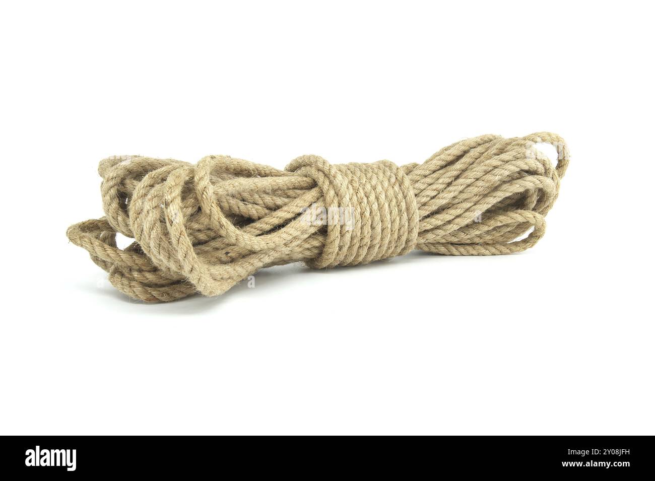 Natural jute fiber rope isolated on white background Stock Photo - Alamy