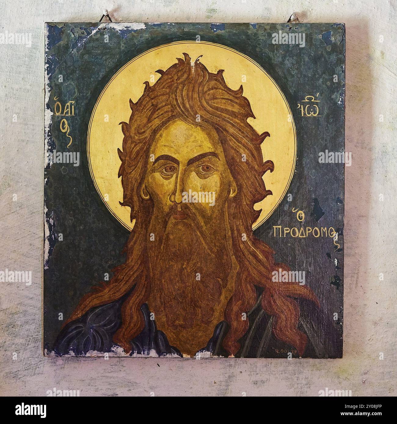 Orthodox icon of a saint with halo on ancient wall painting, Chapel of ...